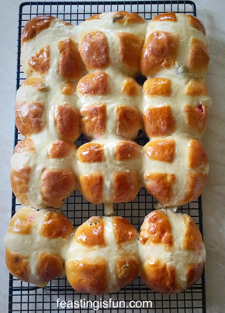 Cherry Bakewell Hot Cross Buns - Feasting Is Fun