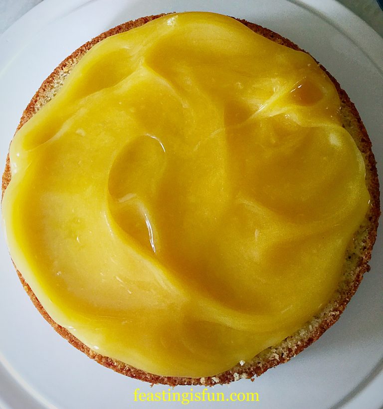 Loveliest Lemon Curd Cake - Feasting Is Fun
