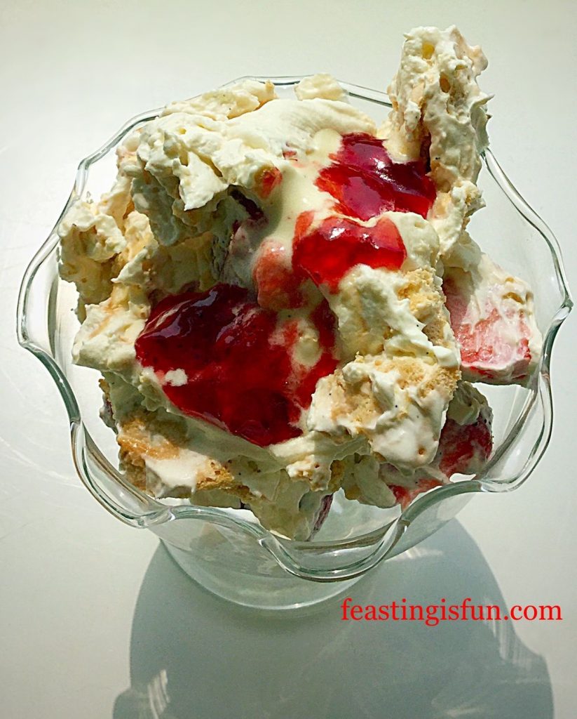 Raspberry Coulis Drizzled Mixed Berry Pavlova - Feasting Is Fun